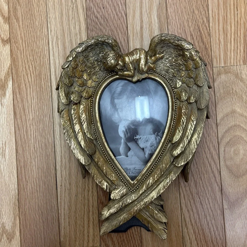 The Unbranded Brand | Accents | Cherub On Gold Angel Wings Heart Shaped ...